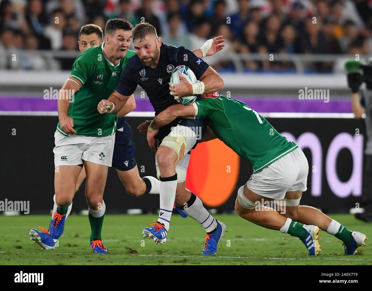 Scotlands John Barclay Is Tackled By Irelands Johnny Sexton And Josh