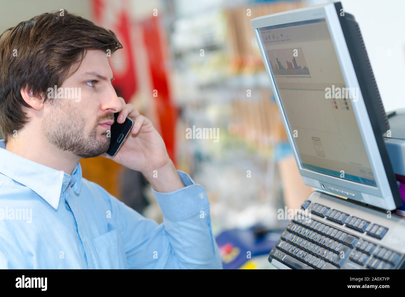 client looking and checking stock availability Stock Photo - Alamy