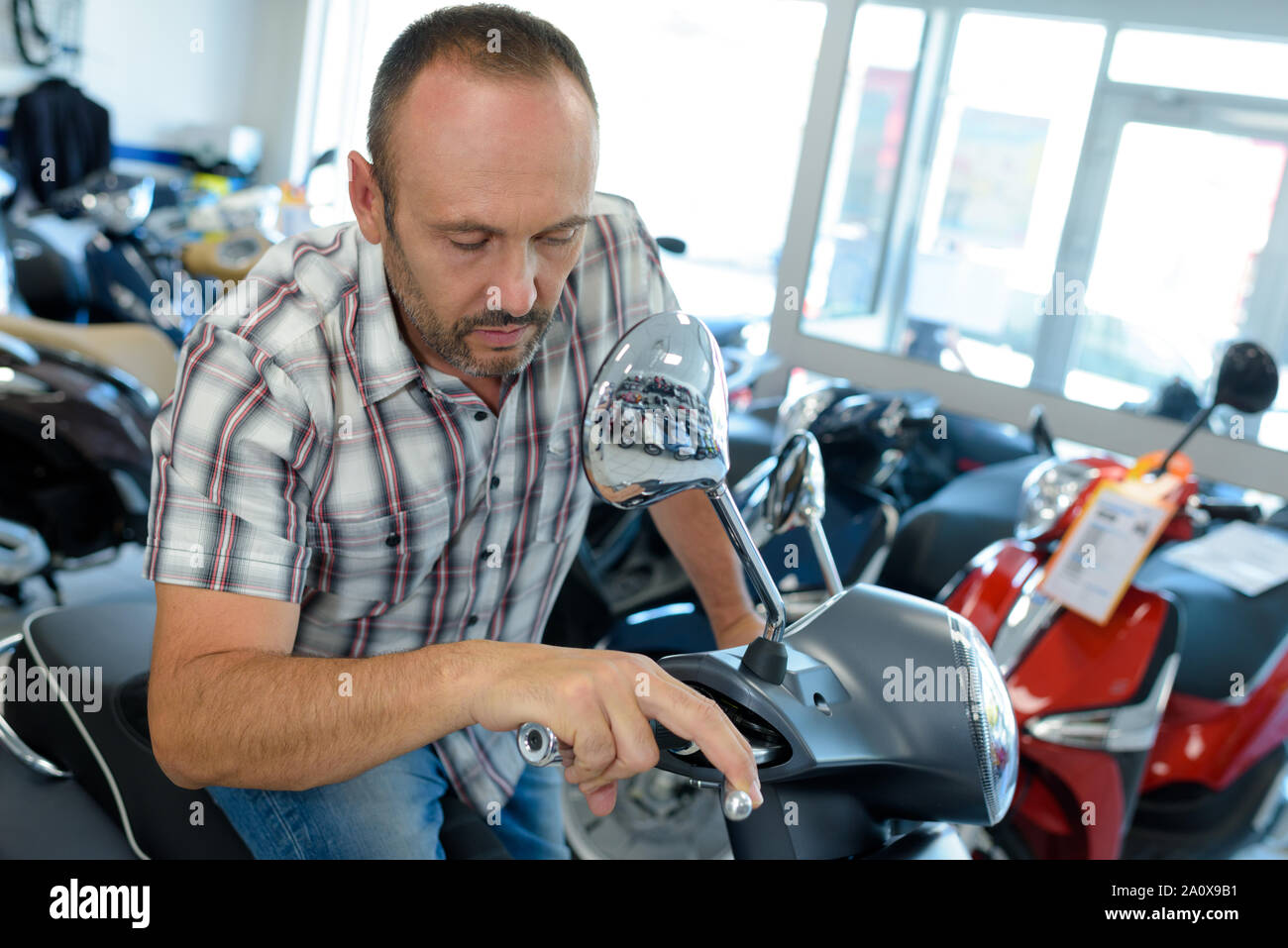 Motorcycle sales man hi-res stock photography and images - Alamy