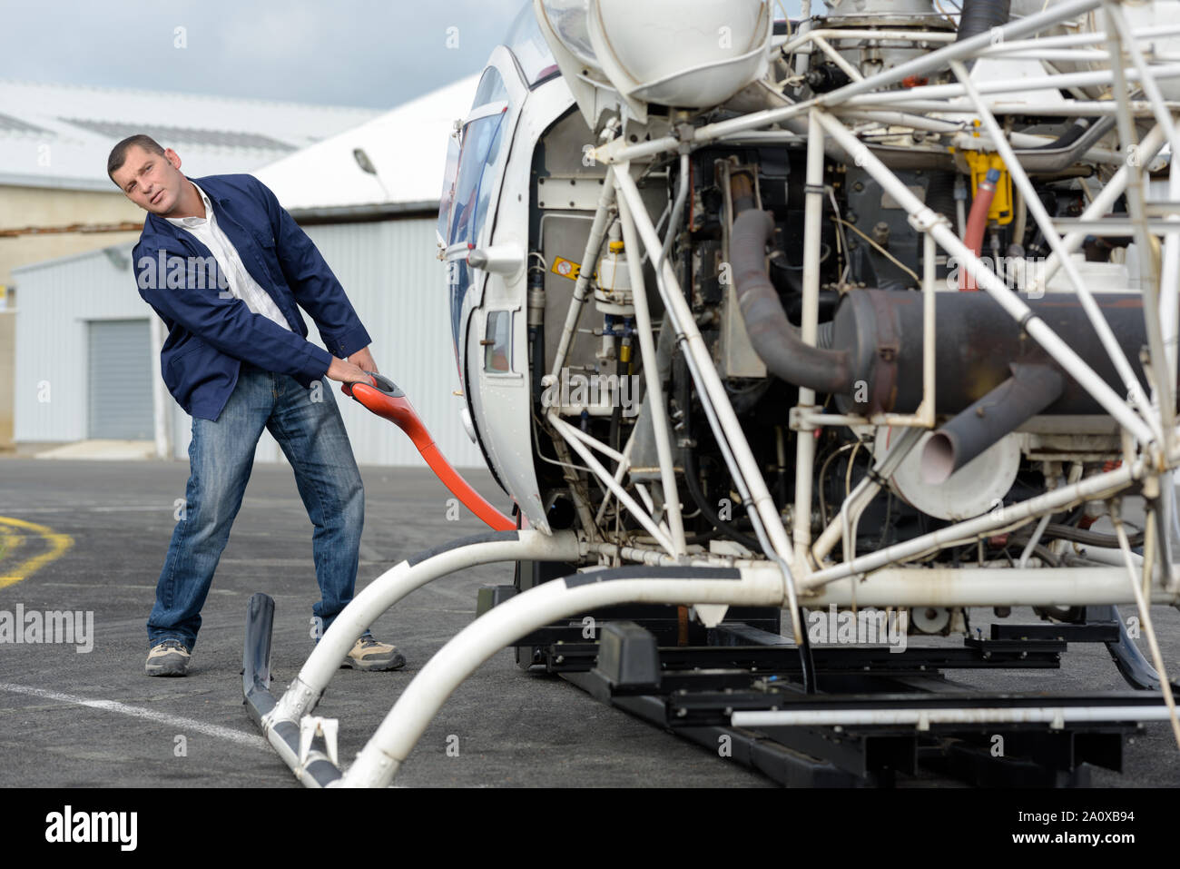 maintenance of the helicopter with parts dissembled Stock Photo - Alamy