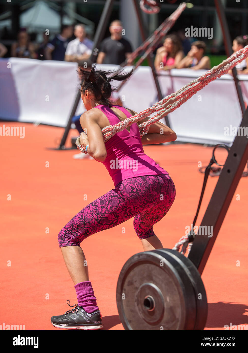 Girl Having Fitness Workout with Rope in an Outdoor Gym Stock Photo - Alamy