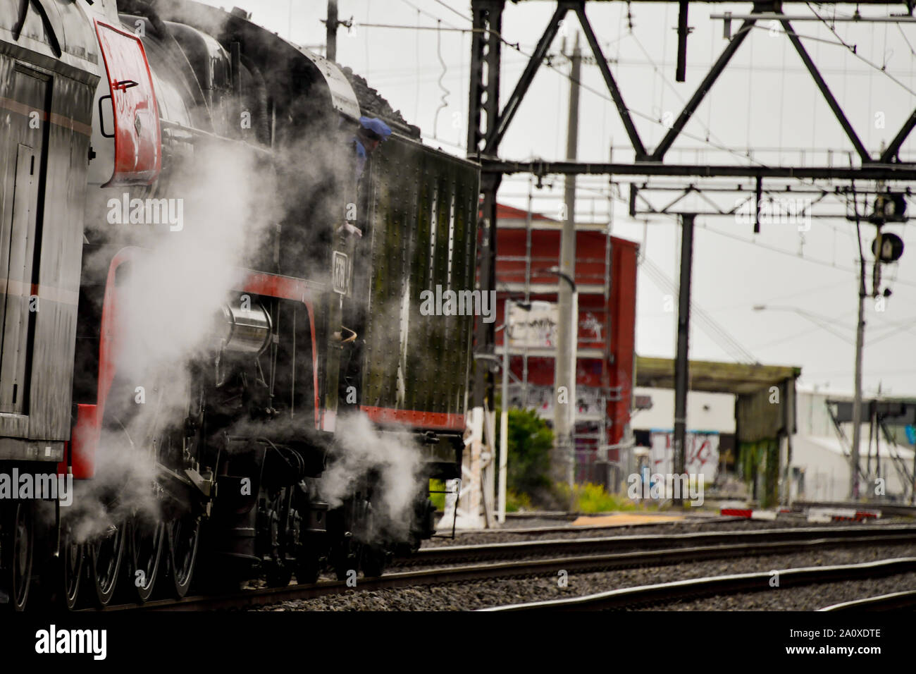 R761 Black and Red Steam Train leaving Newport Workshops with Driver ...
