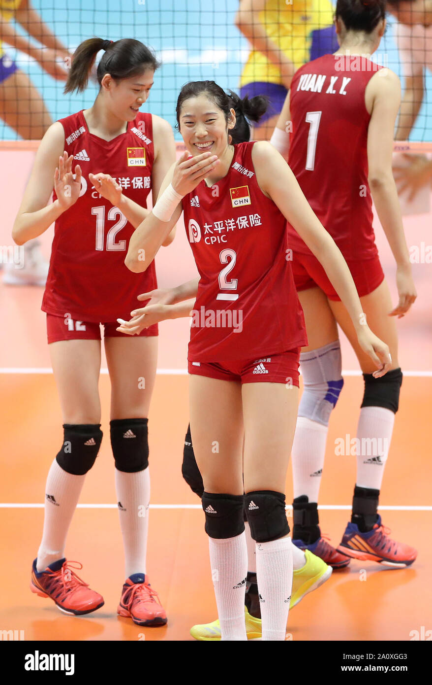 Sapporo, Japan. 22nd Sep, 2019. Zhu Ting (C) of China smiles after scoring during the Round ...