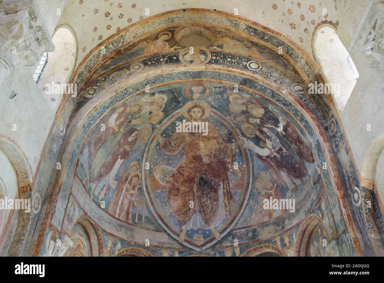 Jesus Christ in the mandorla surrounded by the apostles depicted in the ...