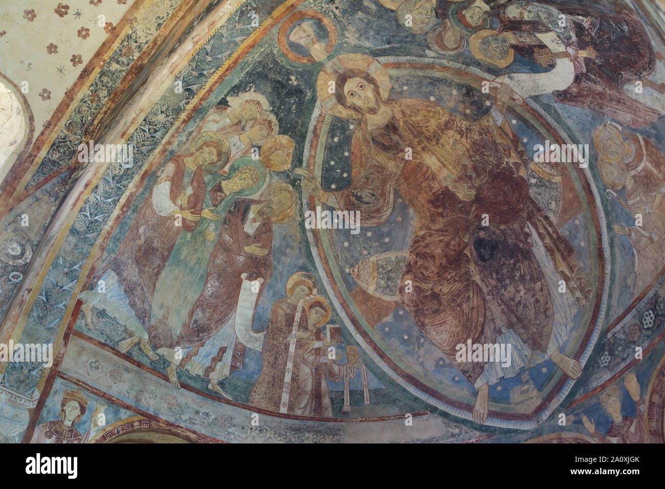 Jesus Christ in the mandorla surrounded by the apostles depicted in the ...