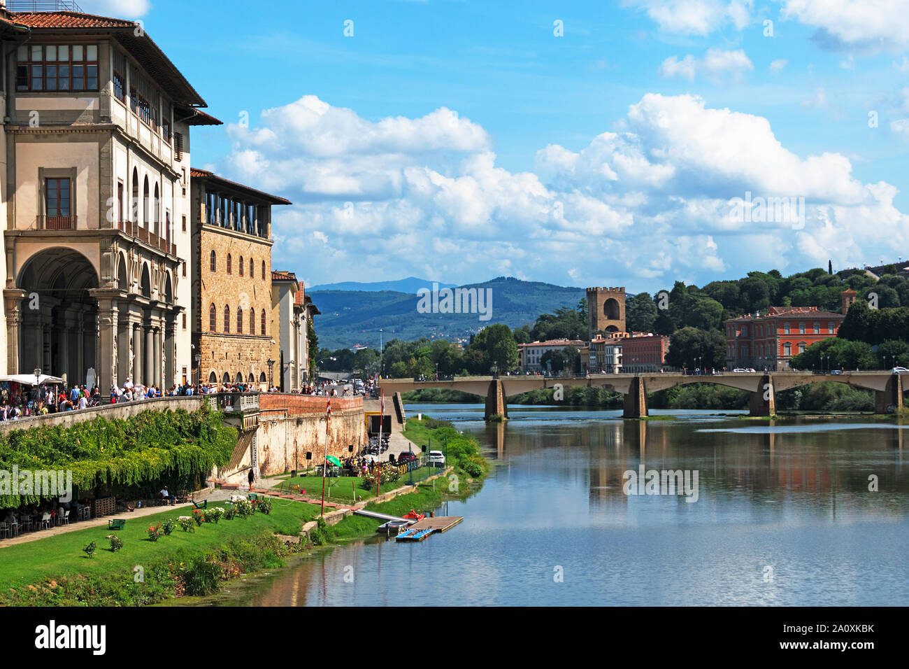 the river arno running through the city of florence, tuscany, italy ...