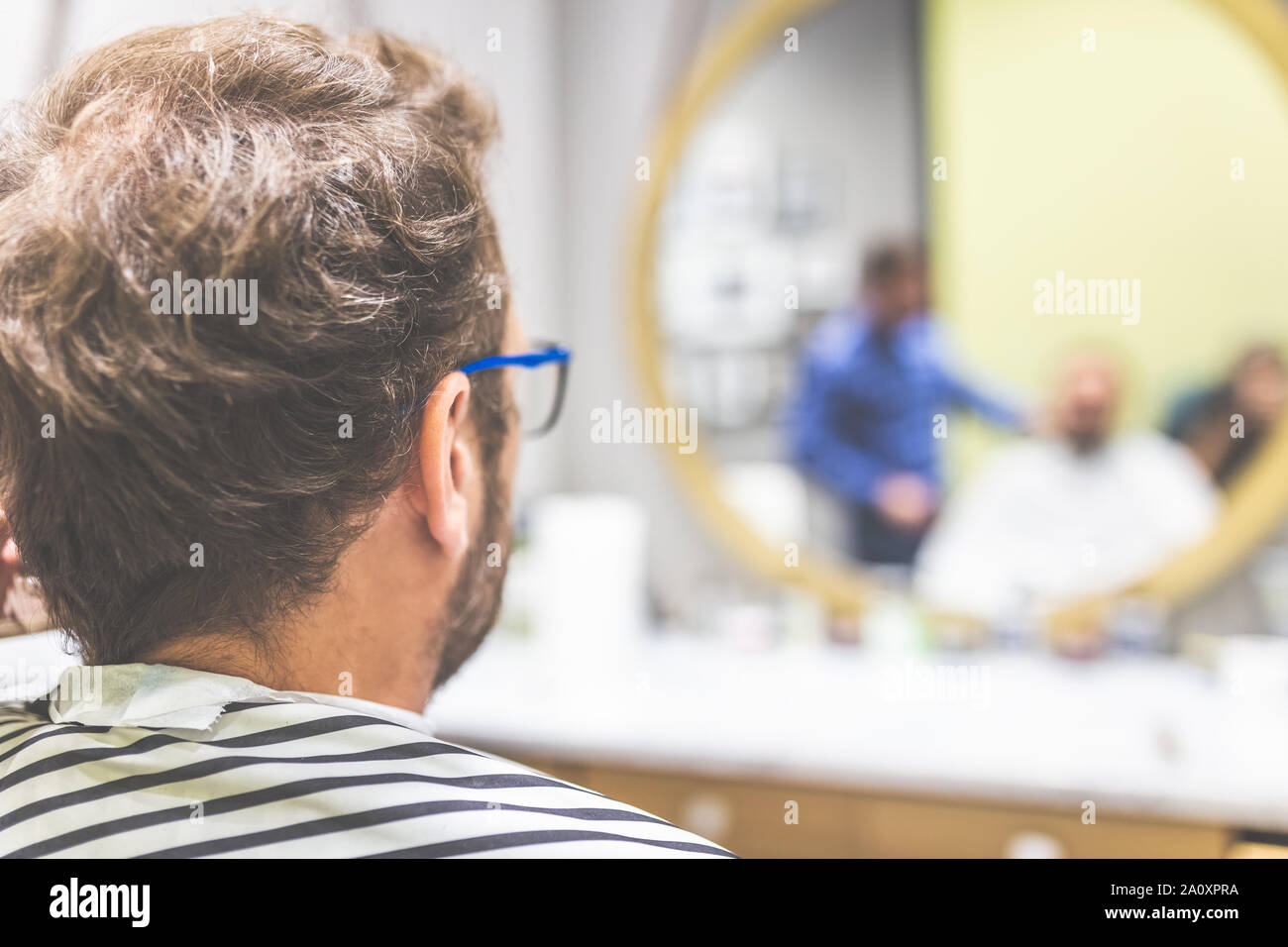 Man barbering in barber hi-res stock photography and images - Alamy