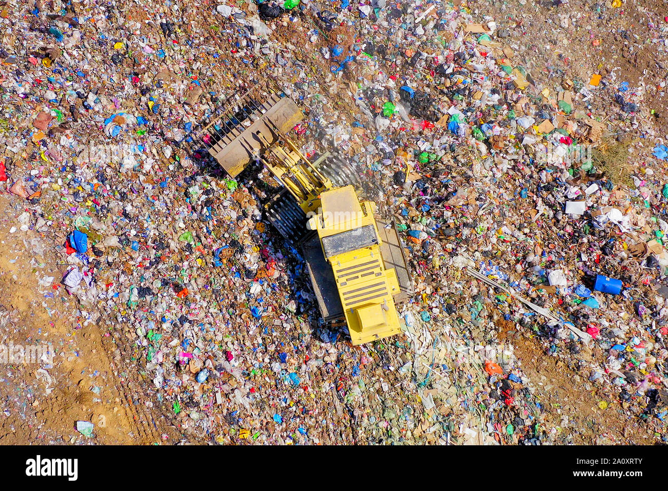 Top down aerial image of a Municipal Solid waste Landfill during ...