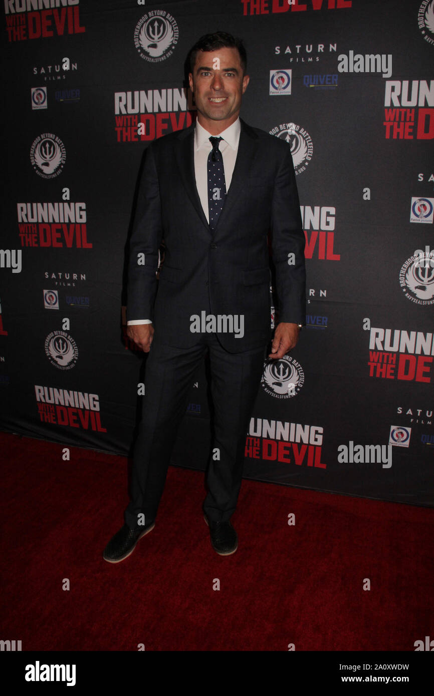 JT Holmes 09/16/2019 "Running with the Devil" premiere held at Writers ...