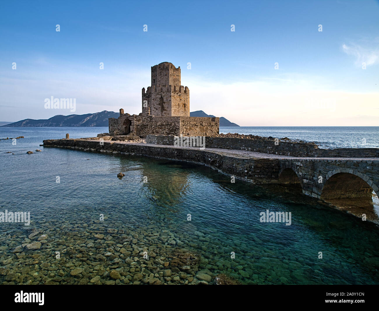 Stone bridge leading to impressive three-tiered watchtower in the ...