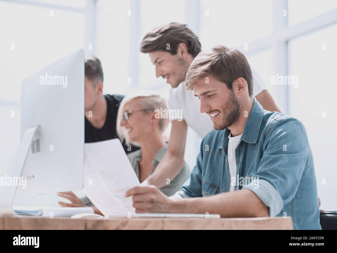 close up. a group of people working on computers Stock Photo - Alamy