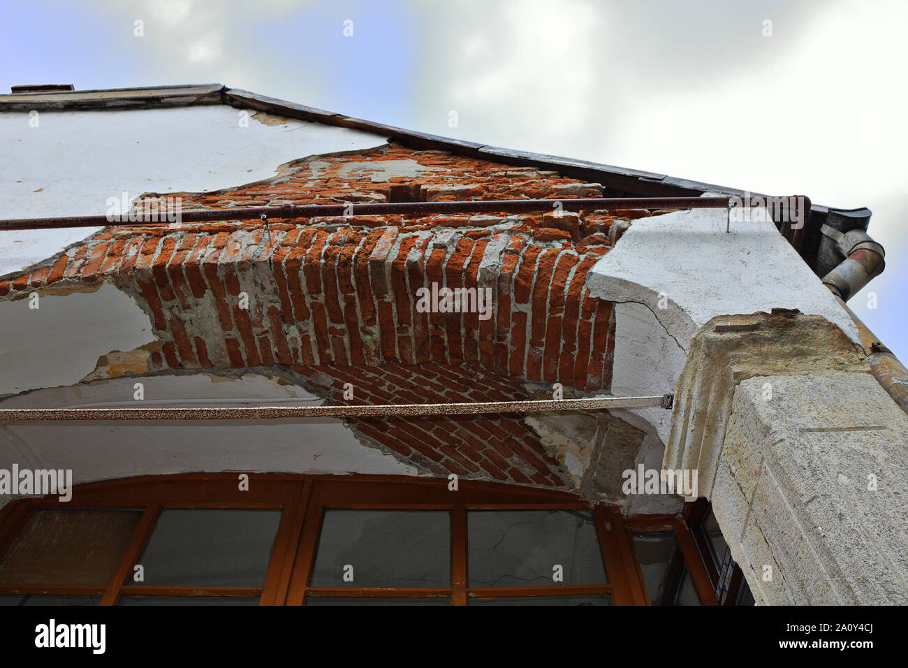 dampness effect on old house, plaster layer destroyed by rain water ...
