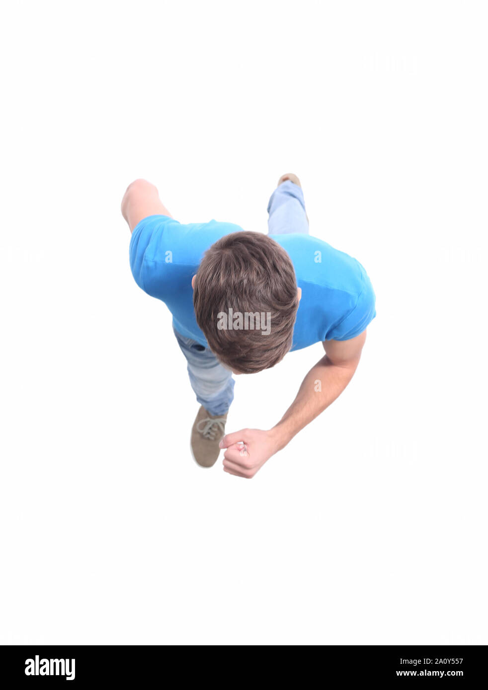 top view. young man stepping forward. isolated on white Stock Photo - Alamy