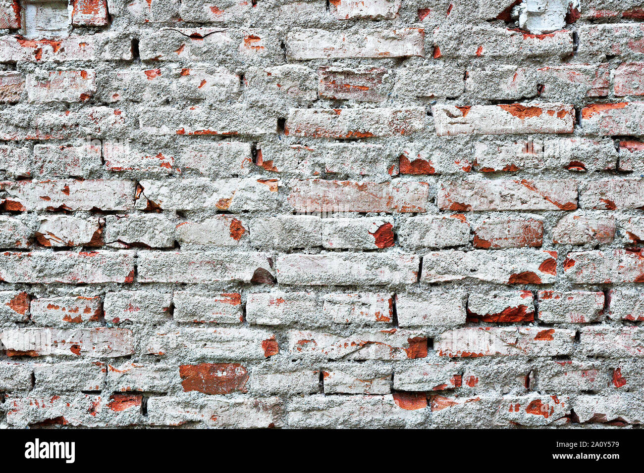 Old damaged brick wall texture hi-res stock photography and images - Alamy