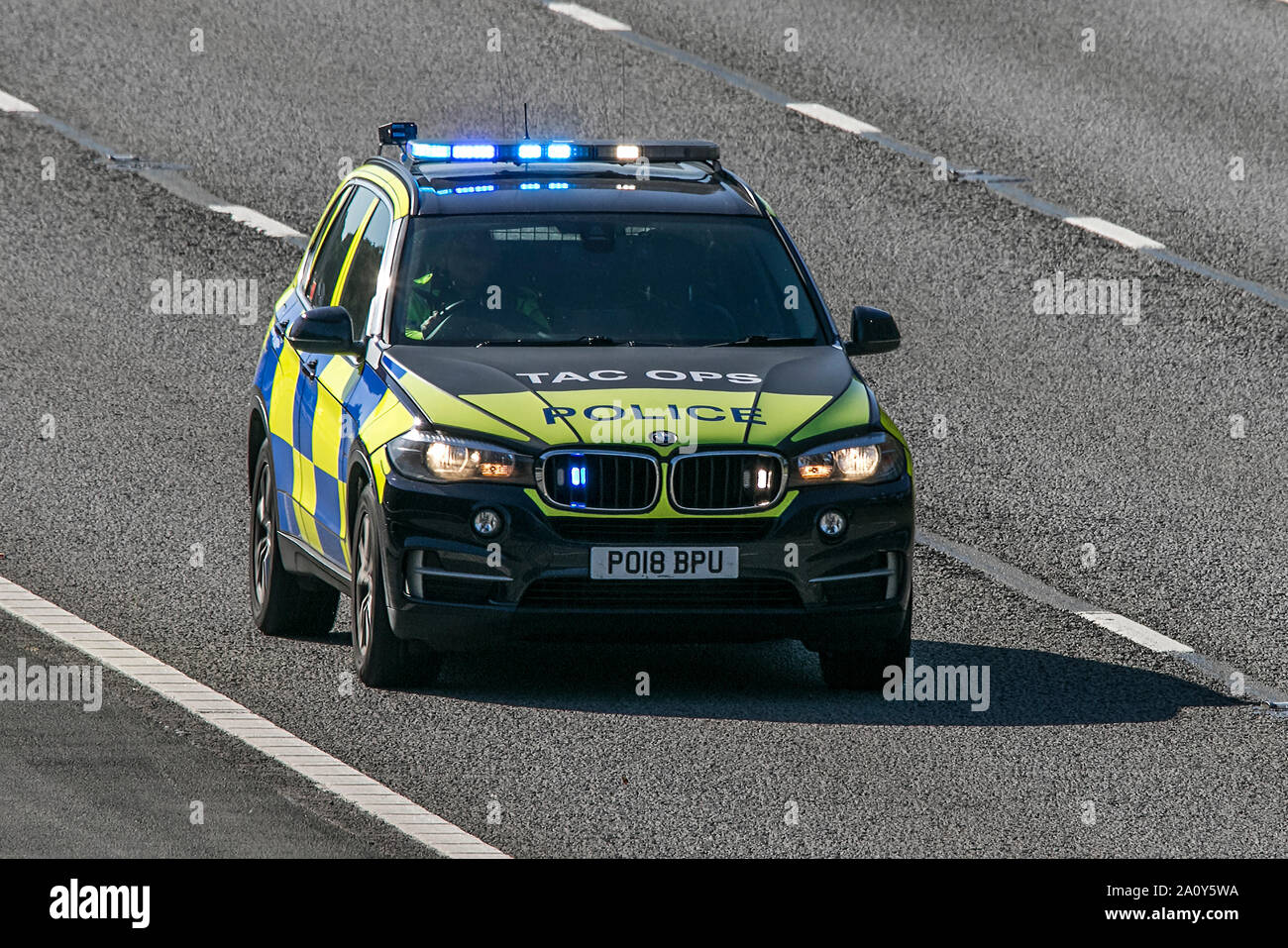 Police vehicles racing to emergency travelling northbound on the M6 ...