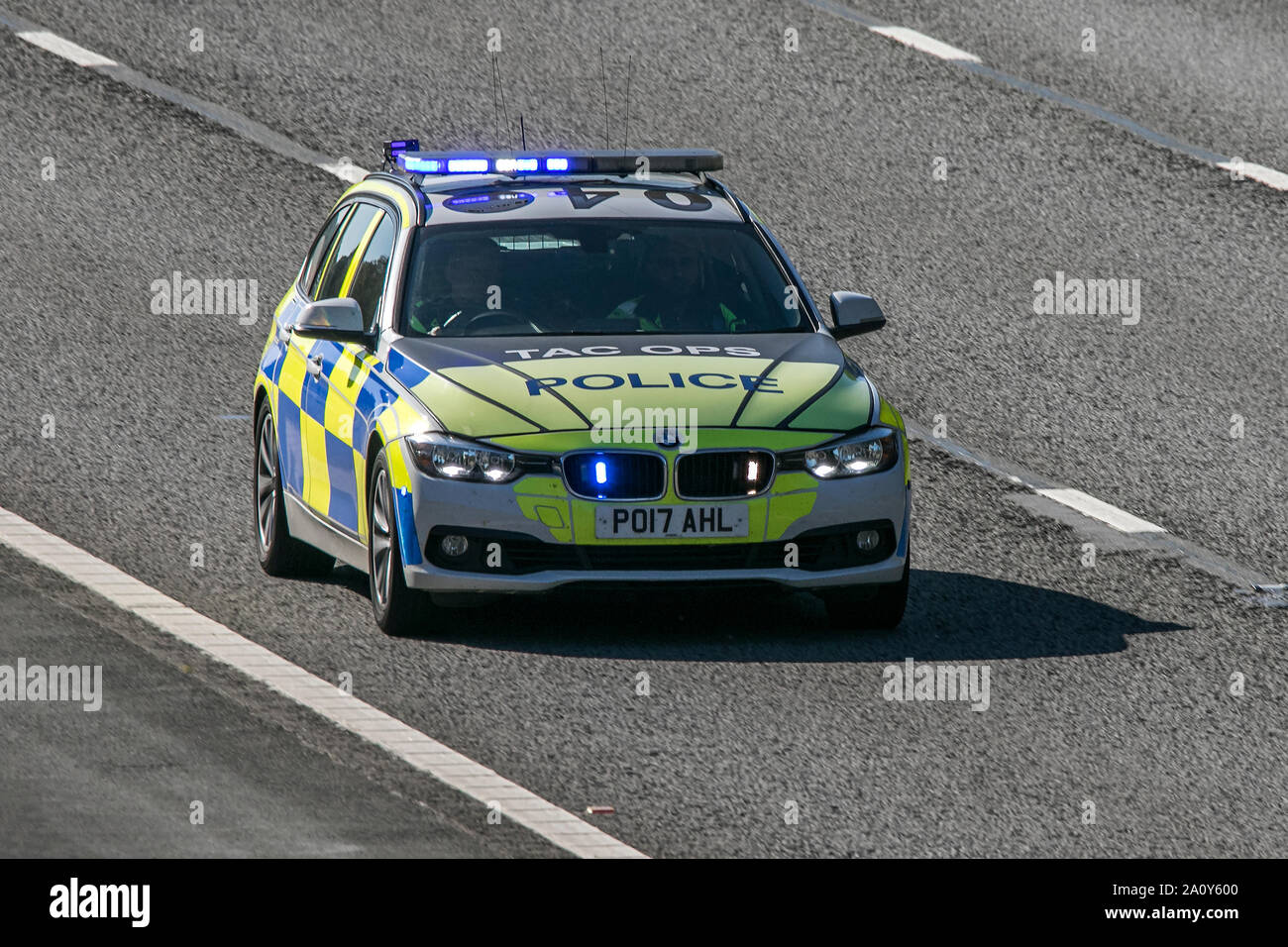 Police vehicles racing to emergency travelling northbound on the M6 ...