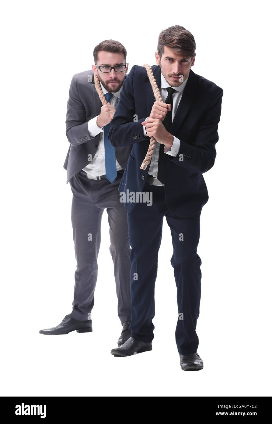 full length . two businessmen pulling a long rope Stock Photo - Alamy