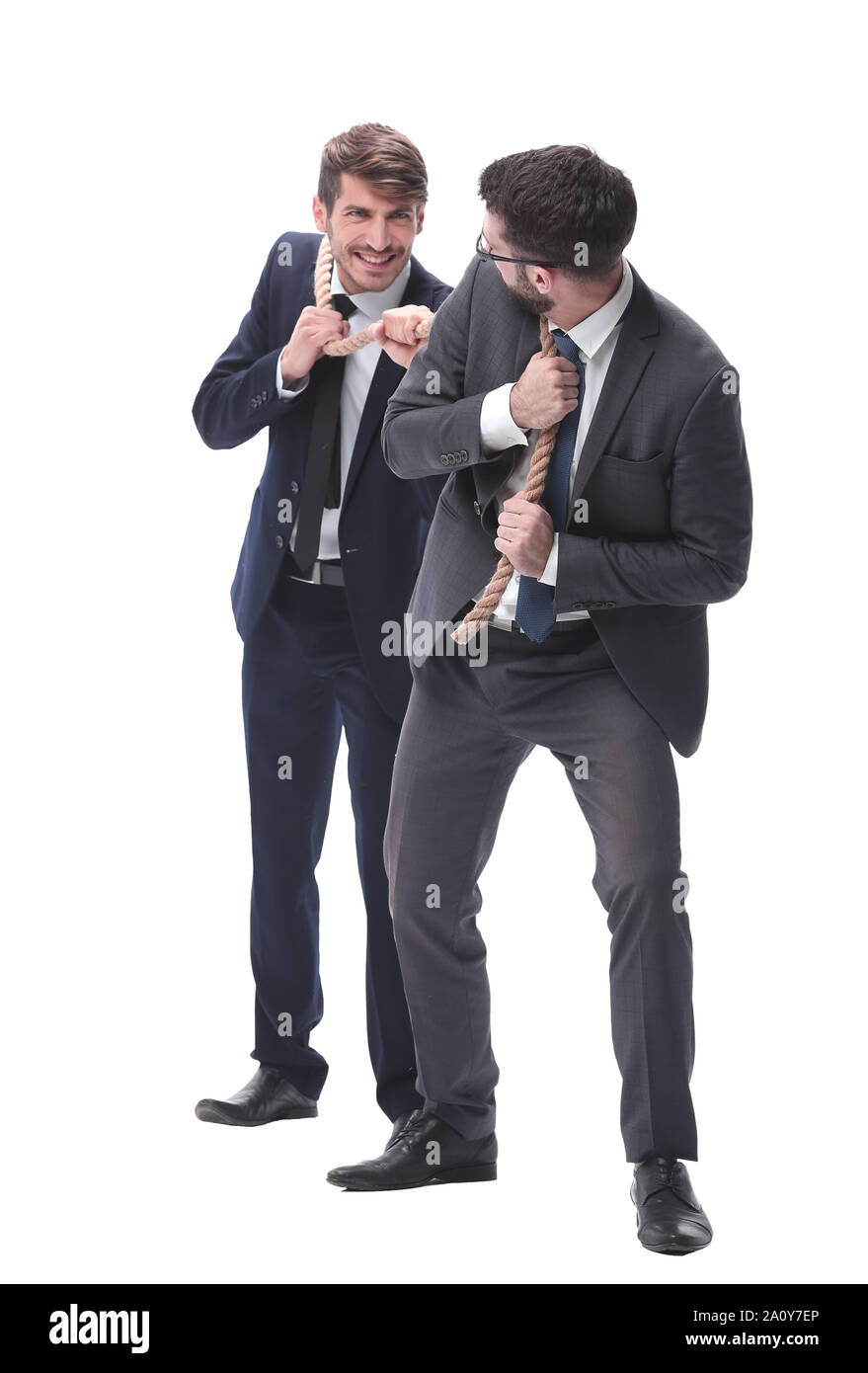 full length . two businessmen pulling a long rope Stock Photo - Alamy
