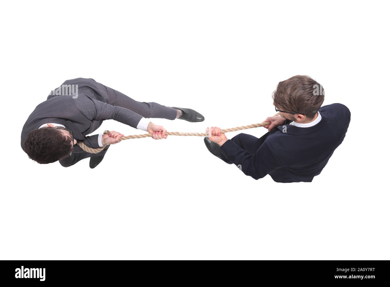 top view. two young businessmen pulling the rope Stock Photo - Alamy