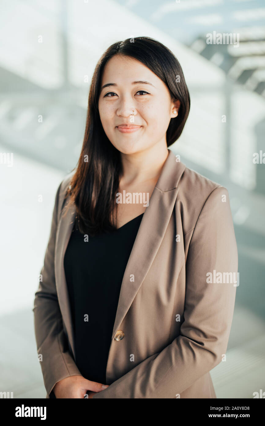 Confidently smiling asian business woman Stock Photo - Alamy Confidently smiling asian business woman Stock Photo - Alamy
