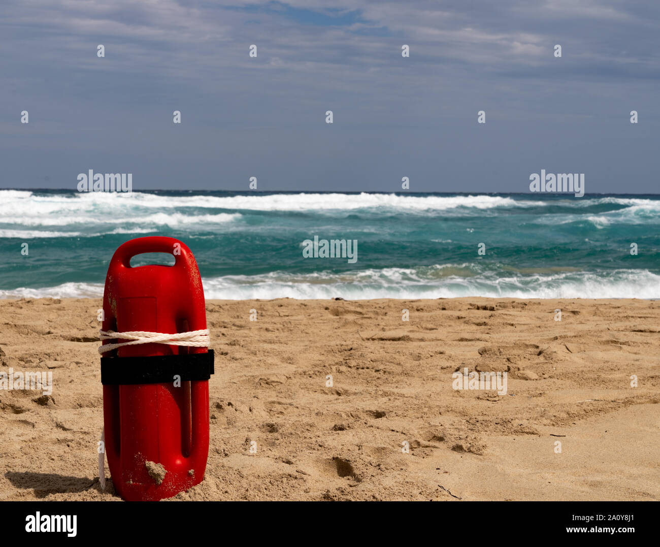 Red baywatch buoy at beach Stock Photo - Alamy