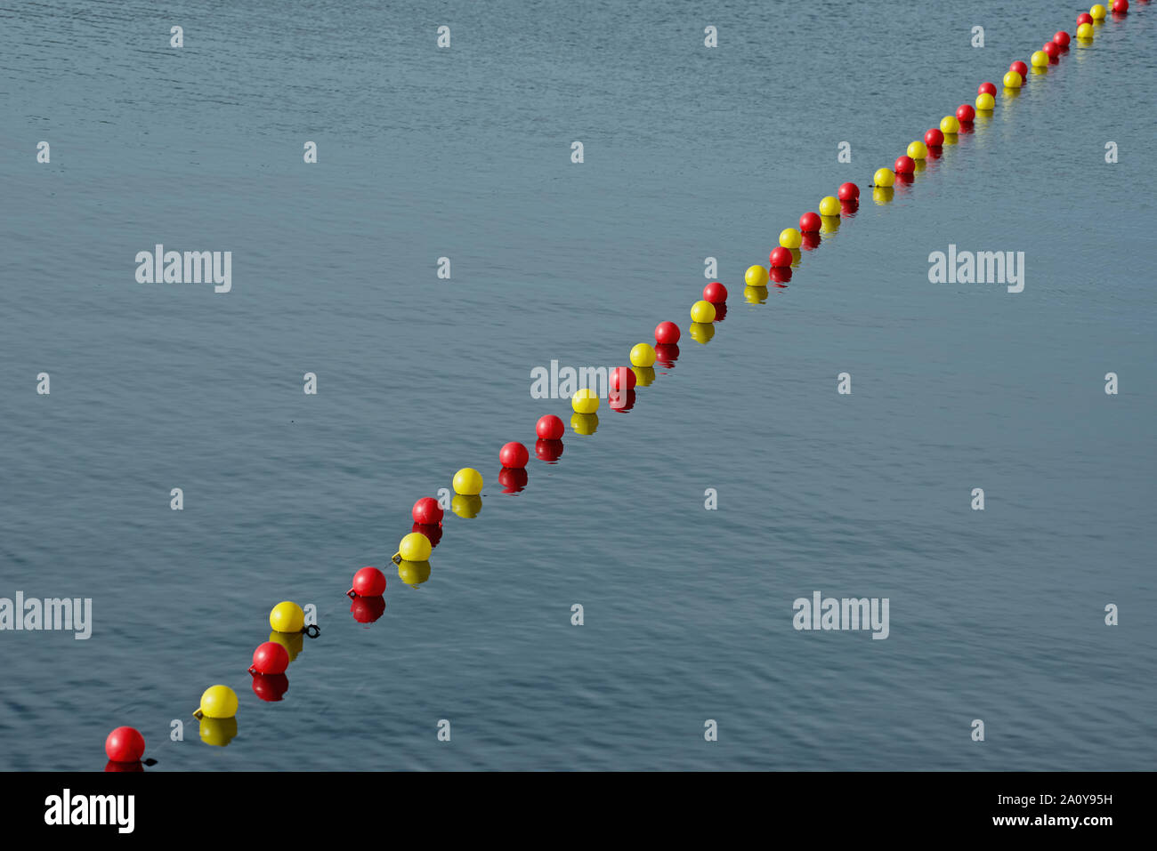 Coloured objects in water Stock Photo - Alamy