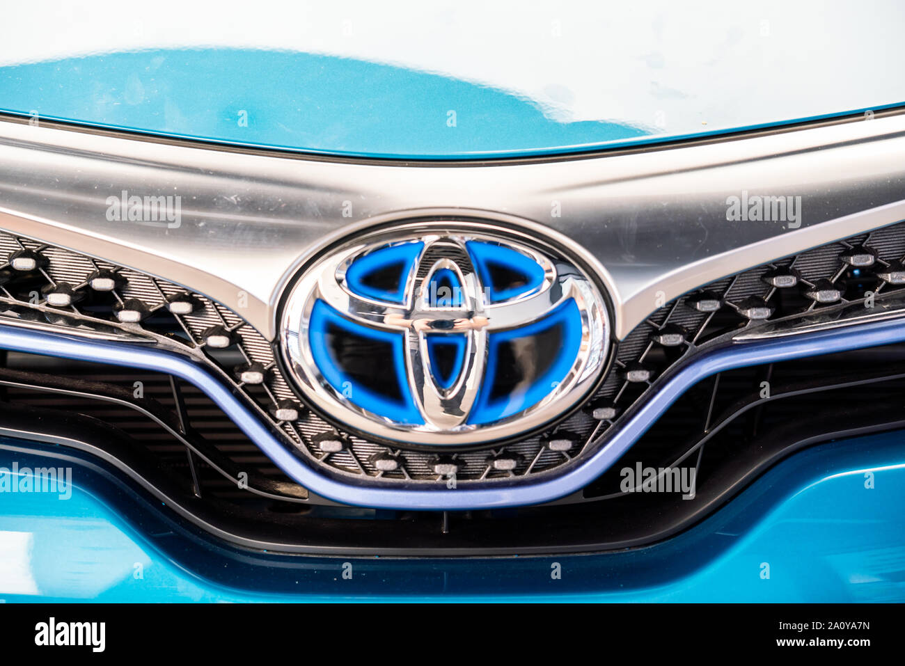Toyota logo on a Toyota Levin plug-in hybrid electric vehicle displayed ...