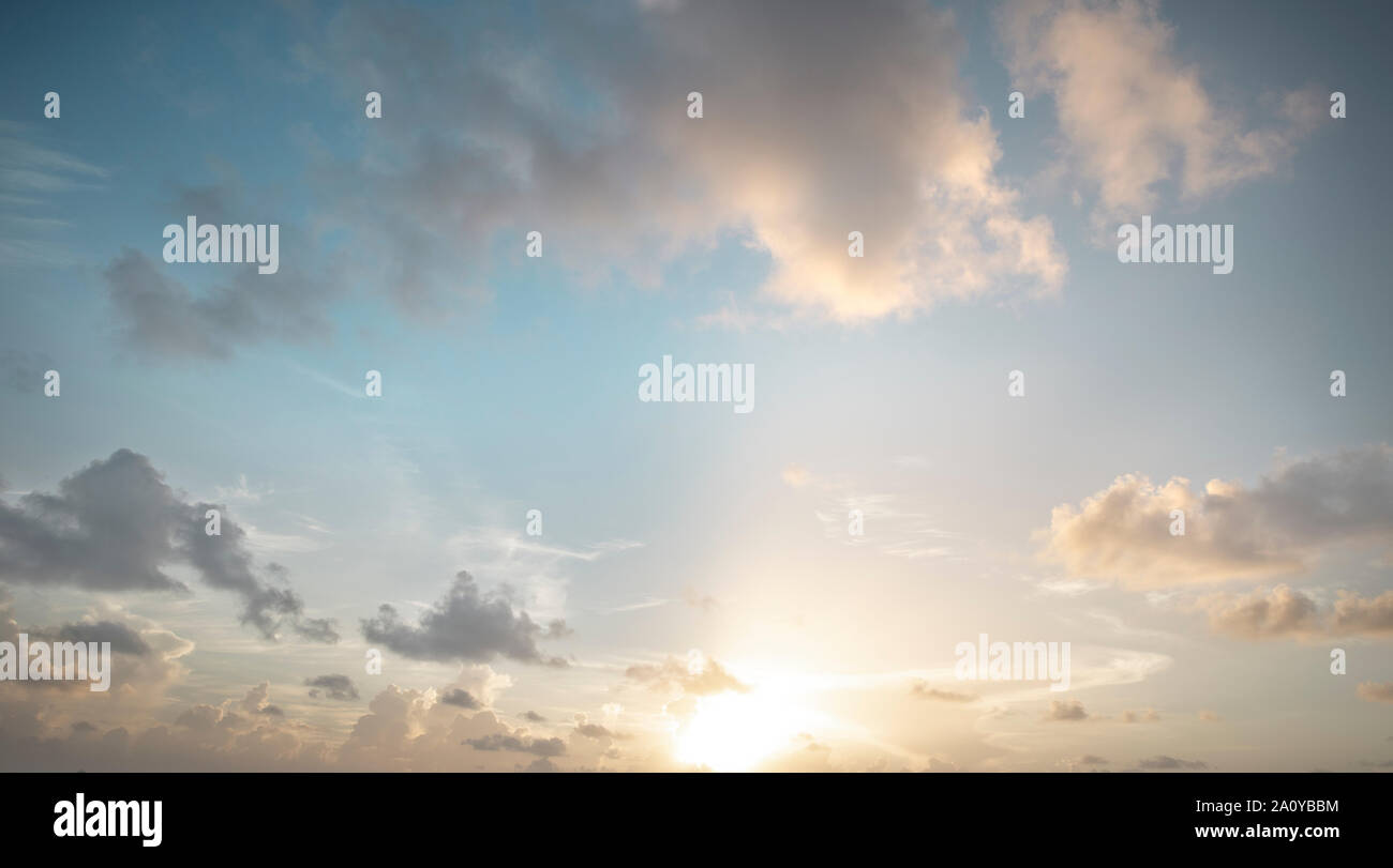 Beautiful morning sky at sunrise with fluffy clouds Stock Photo - Alamy