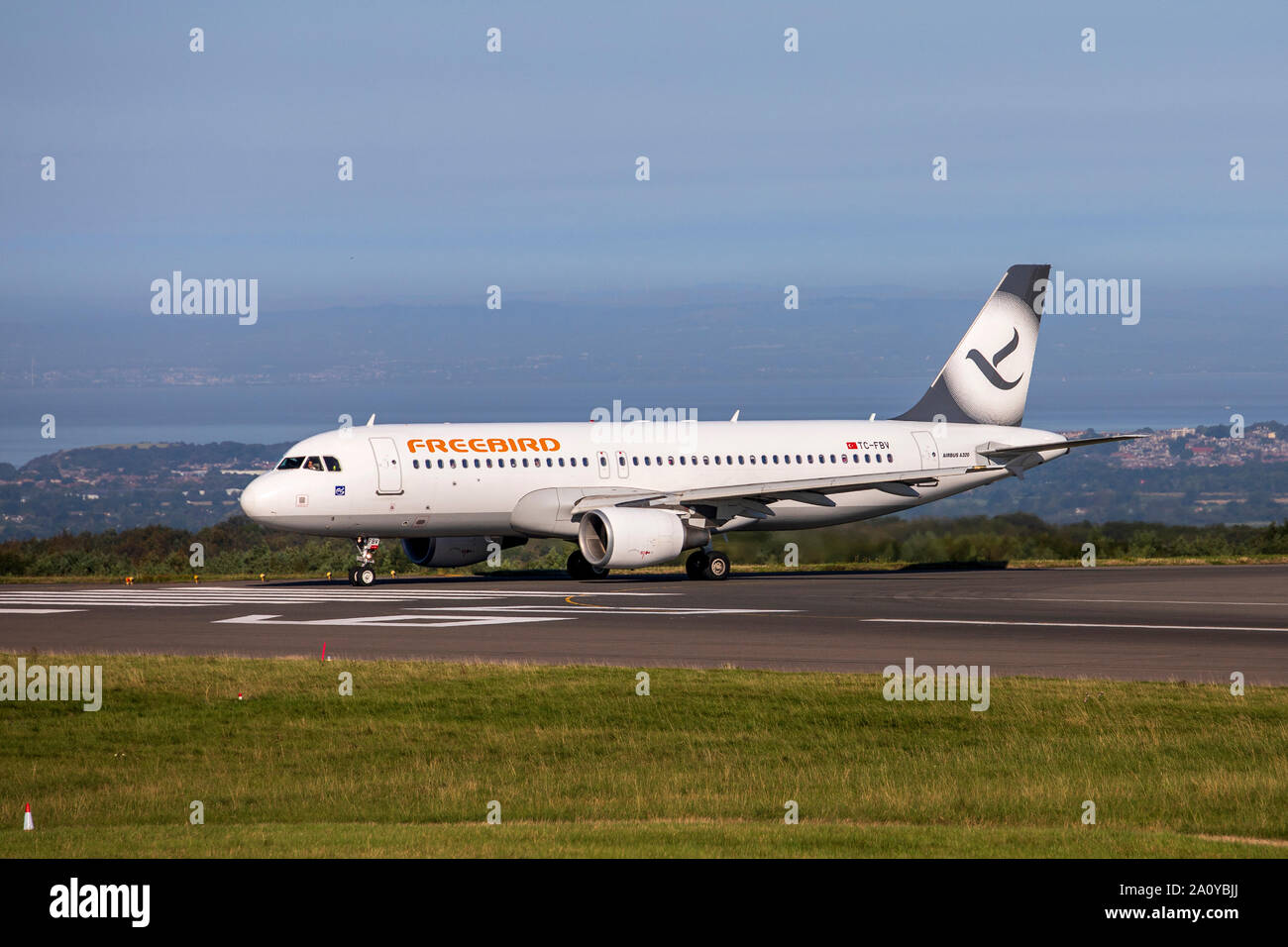 FreeBird TC-FBV, Airbus A320-214, On the runway at Bristol Airport ...