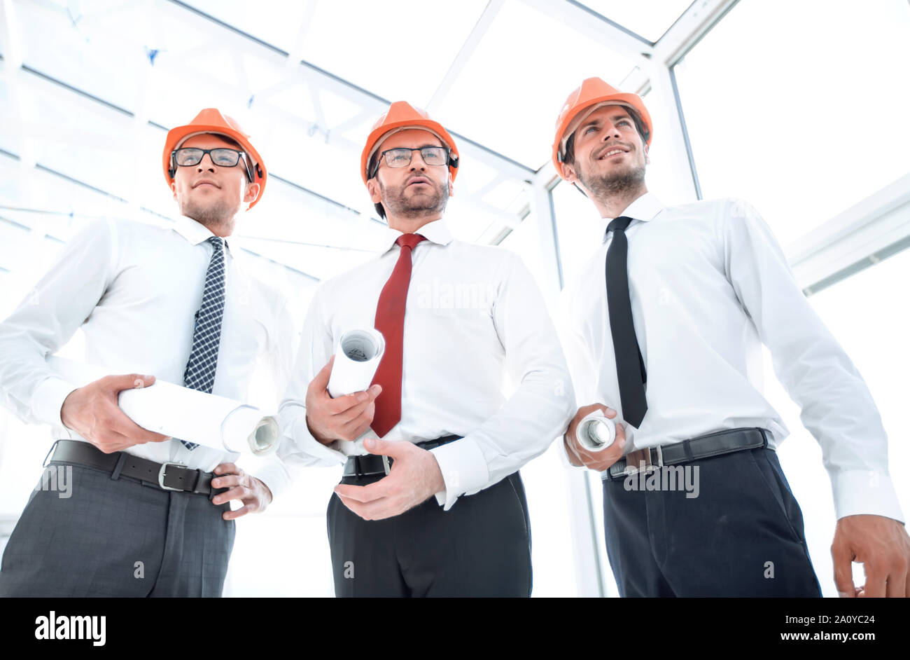 Three builders work together construction hi-res stock photography and ...