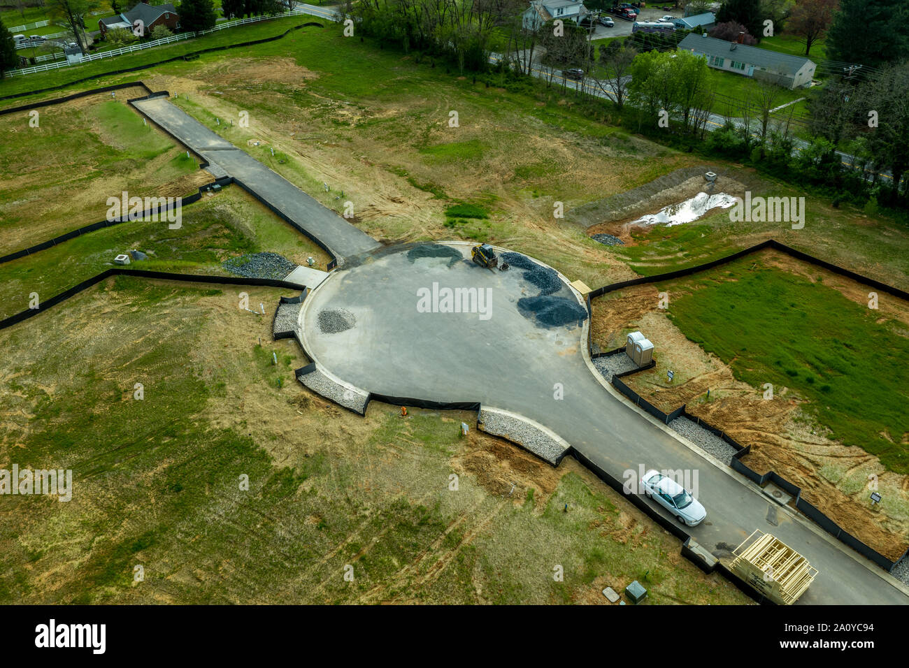 Aerial view of a new neighborhood construction site with lots assigned ...