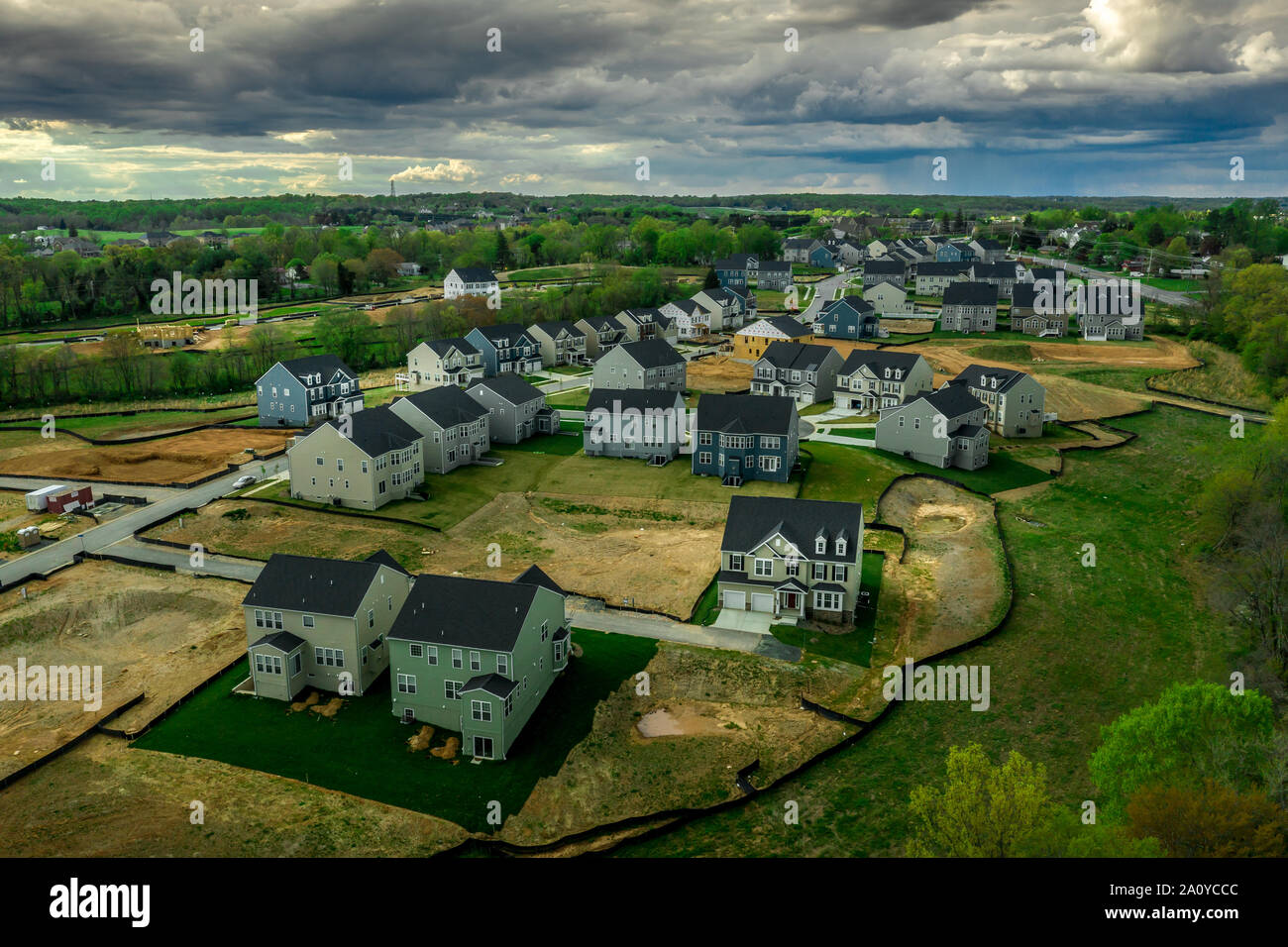 Aerial panorama of newly constructed single family homes in an upper ...