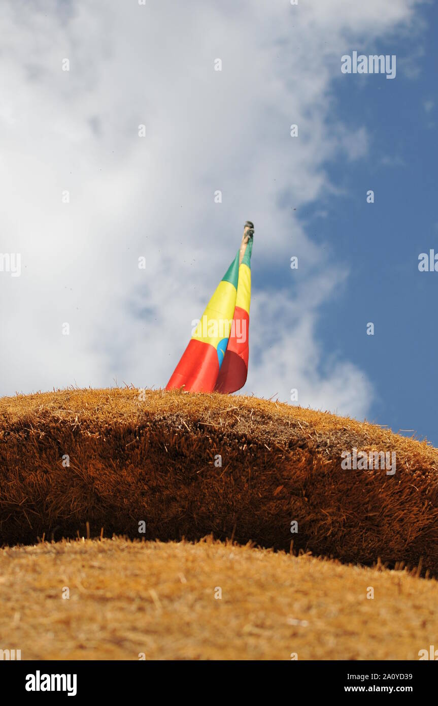 Ethiopian hut with Ethiopian flag on its roof Stock Photo - Alamy