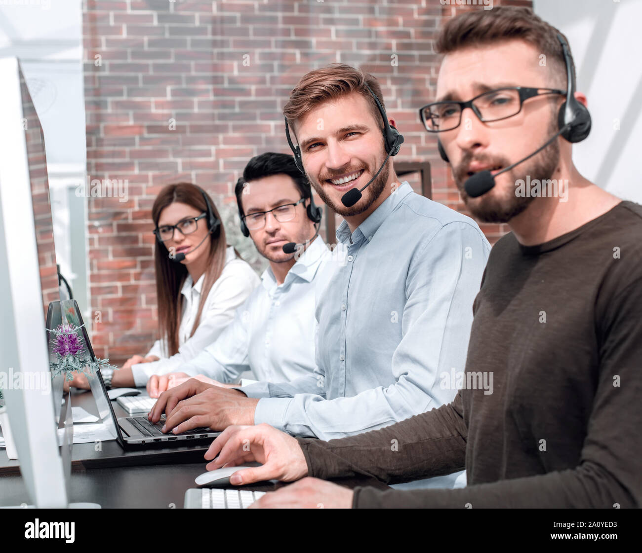 professional call center staff in the workplace Stock Photo - Alamy