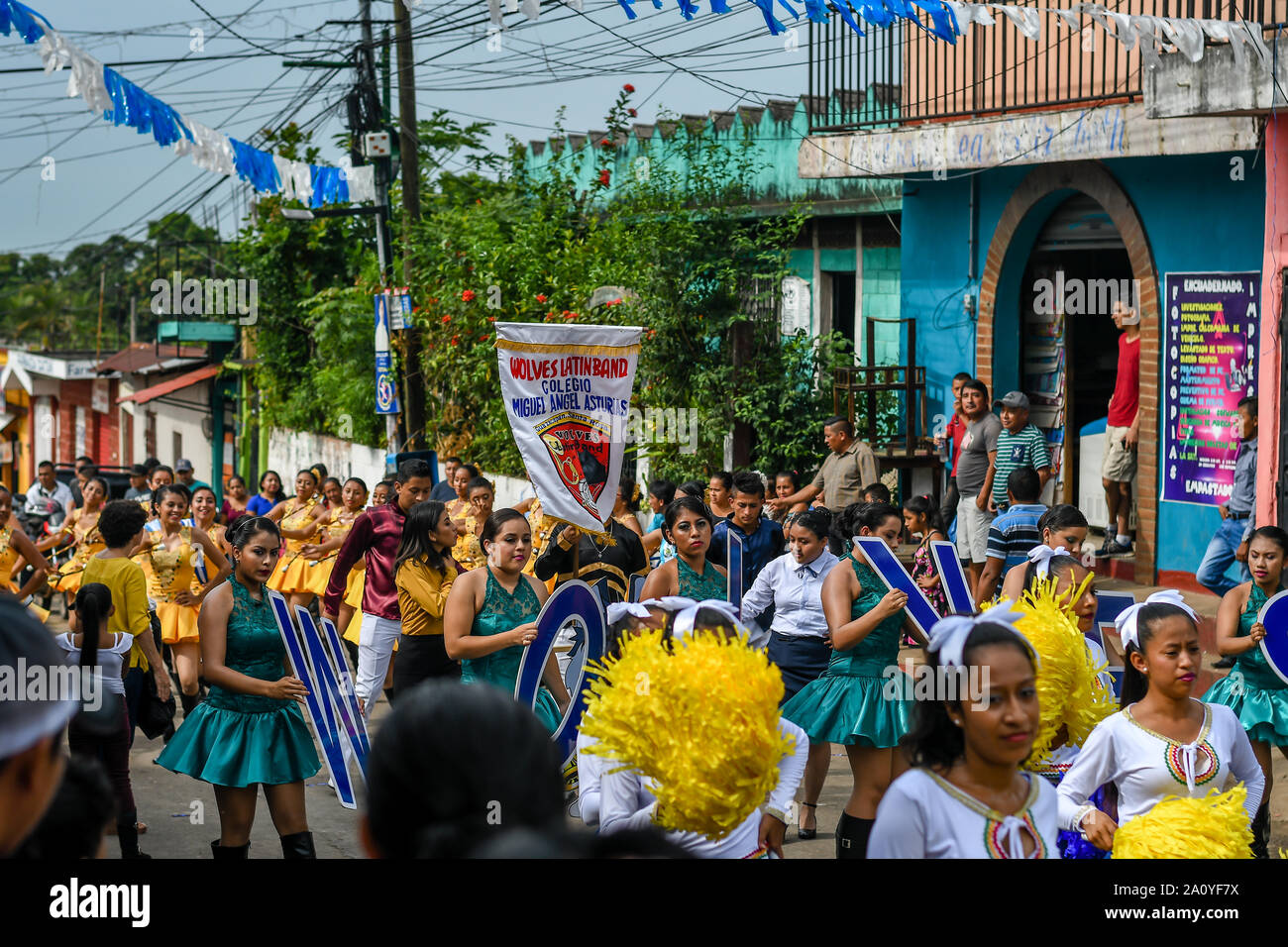 Hispanic cheerleaders marching in latin independence day parade in ...
