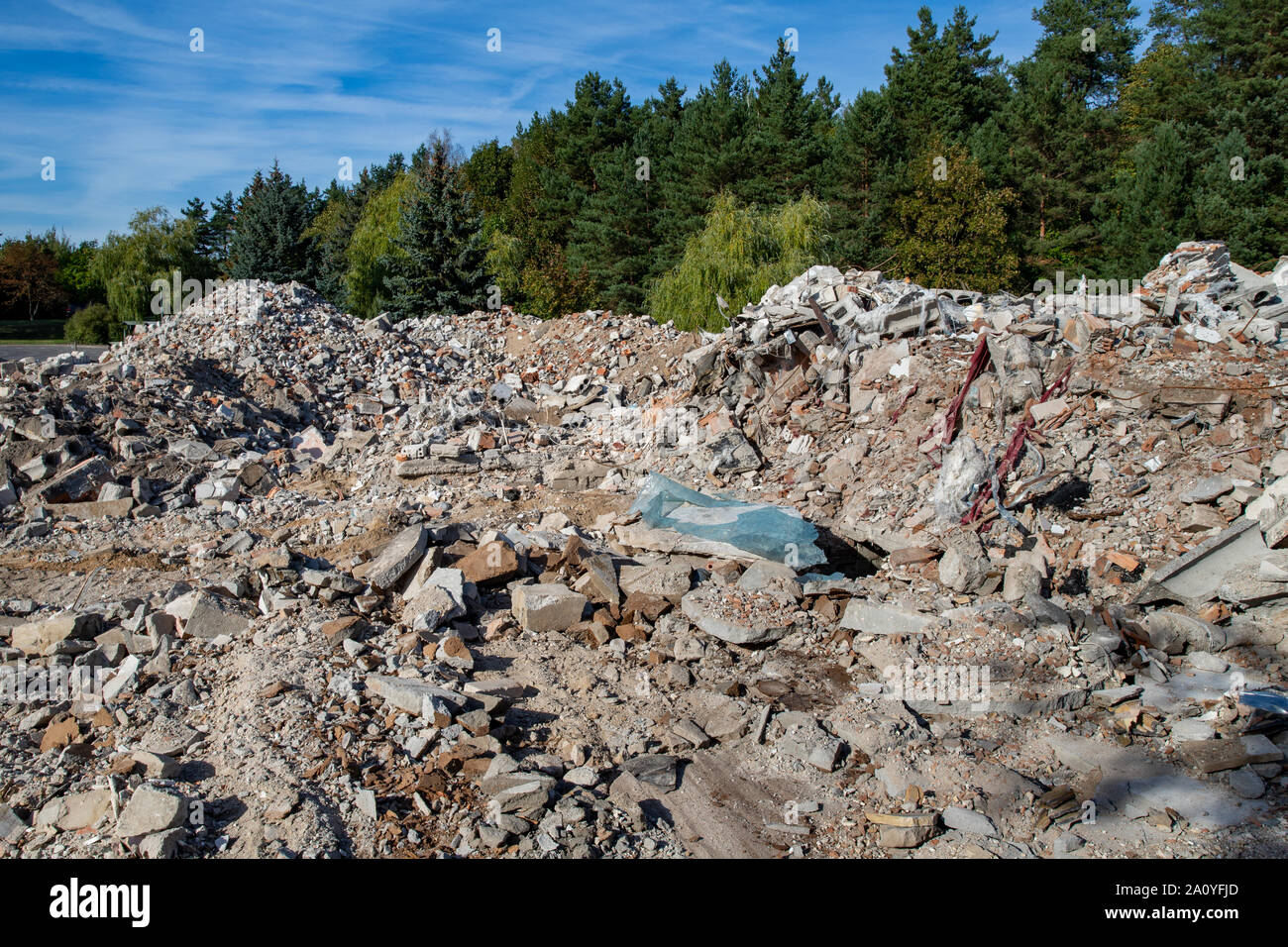 Pile of debris at the demolition of commercial buildings in the city ...