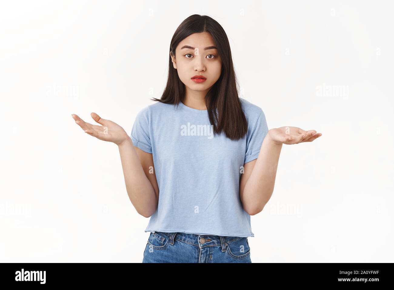 Emotion uncertain smile perplexed hi-res stock photography and images ...