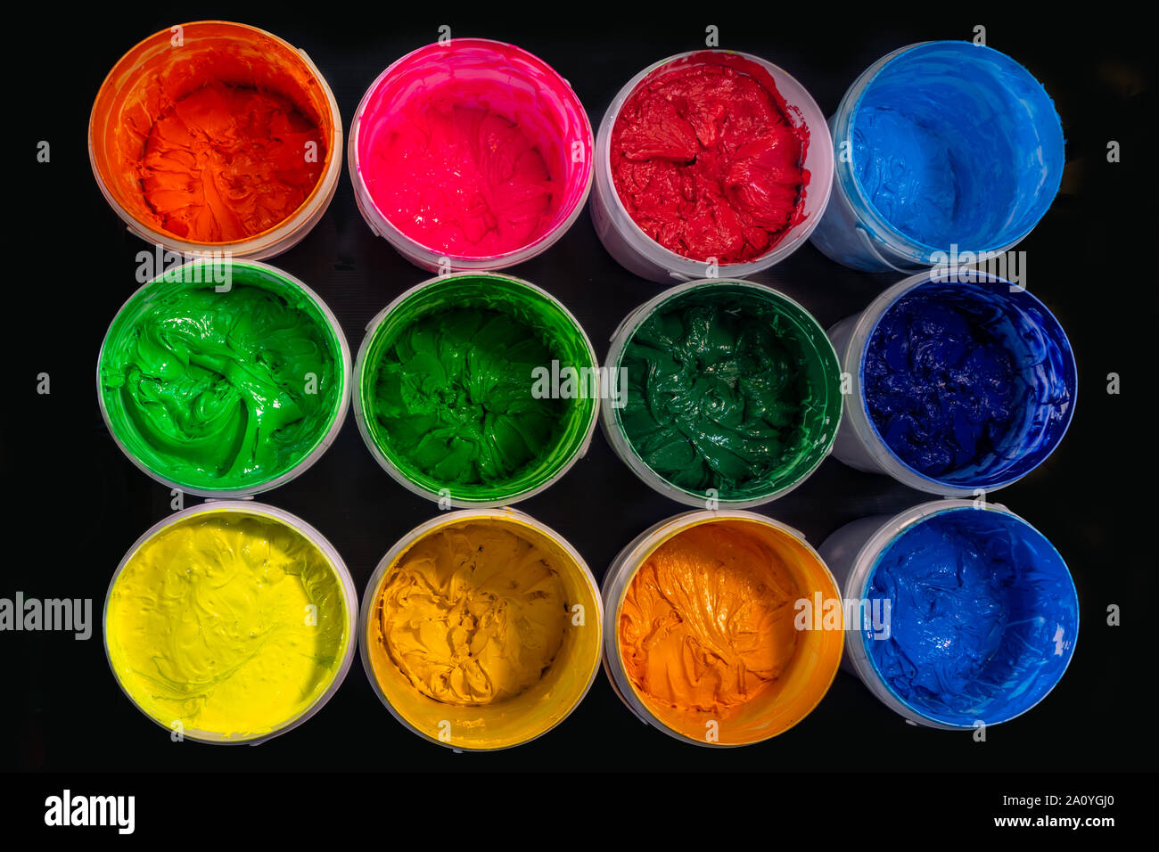 several color plastisol ink cans in factory who use plastisol ink to ...