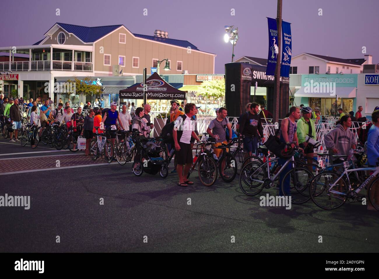Competitors line up pre-race to receive timing chips prior to the ...