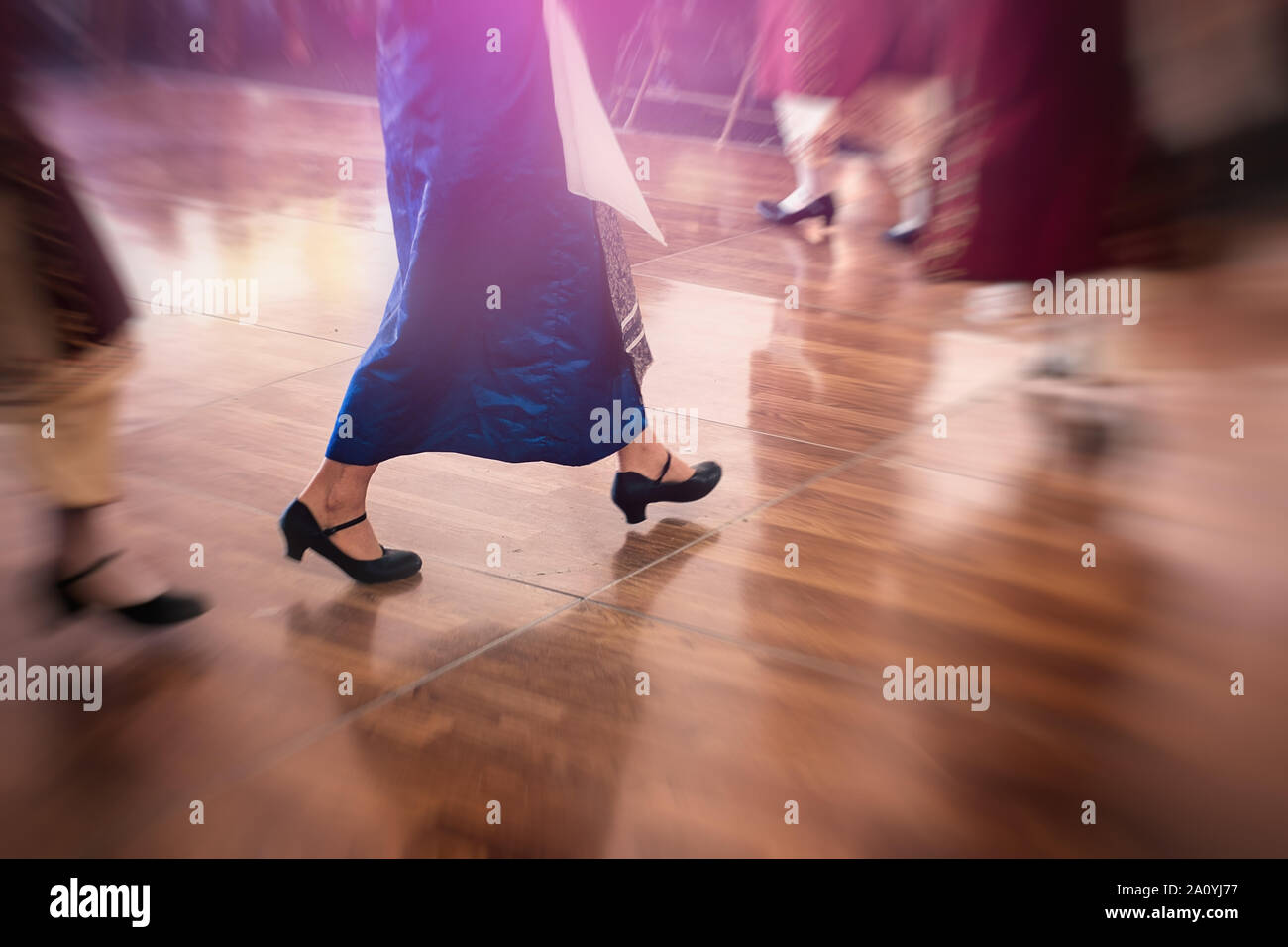 A dancing troupe entertains crowds with a circular dance at a Greek ...