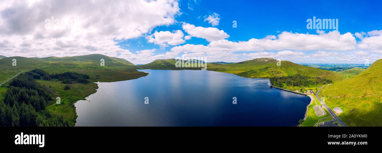aerial panoramic view of sunset reservoir in mourne mountain area ...