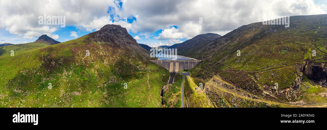 aerial panoramic view of sunset reservoir in mourne mountain area ...