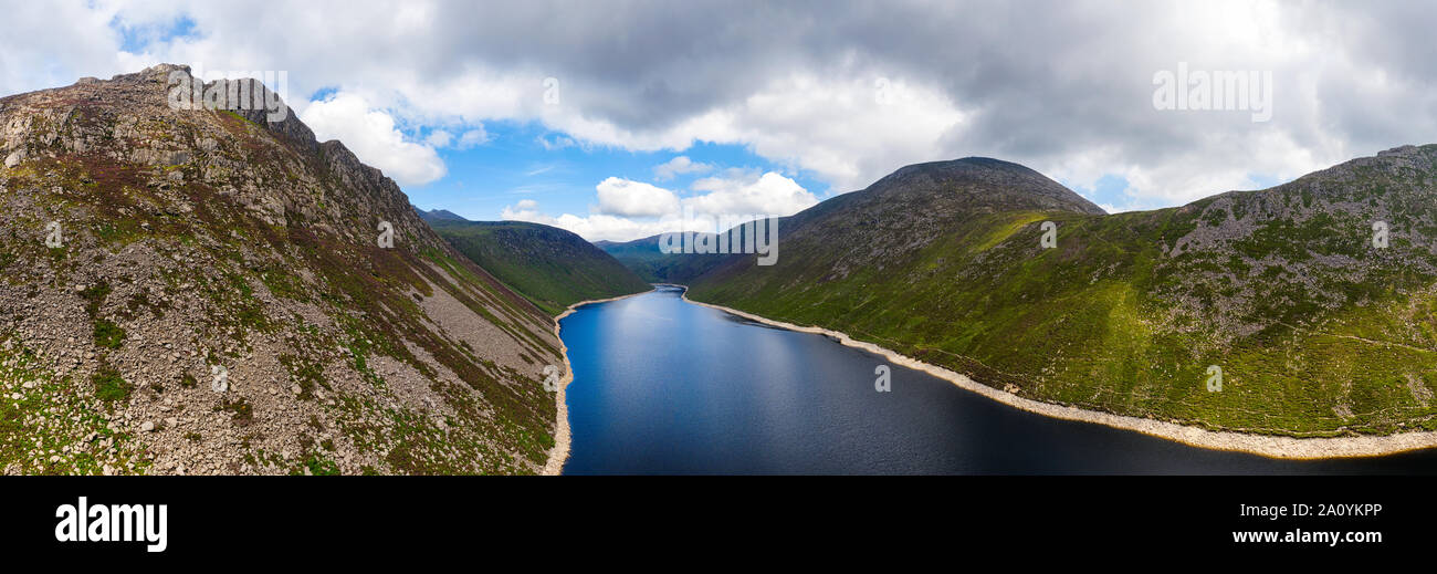 aerial panoramic view of sunset reservoir in mourne mountain area ...