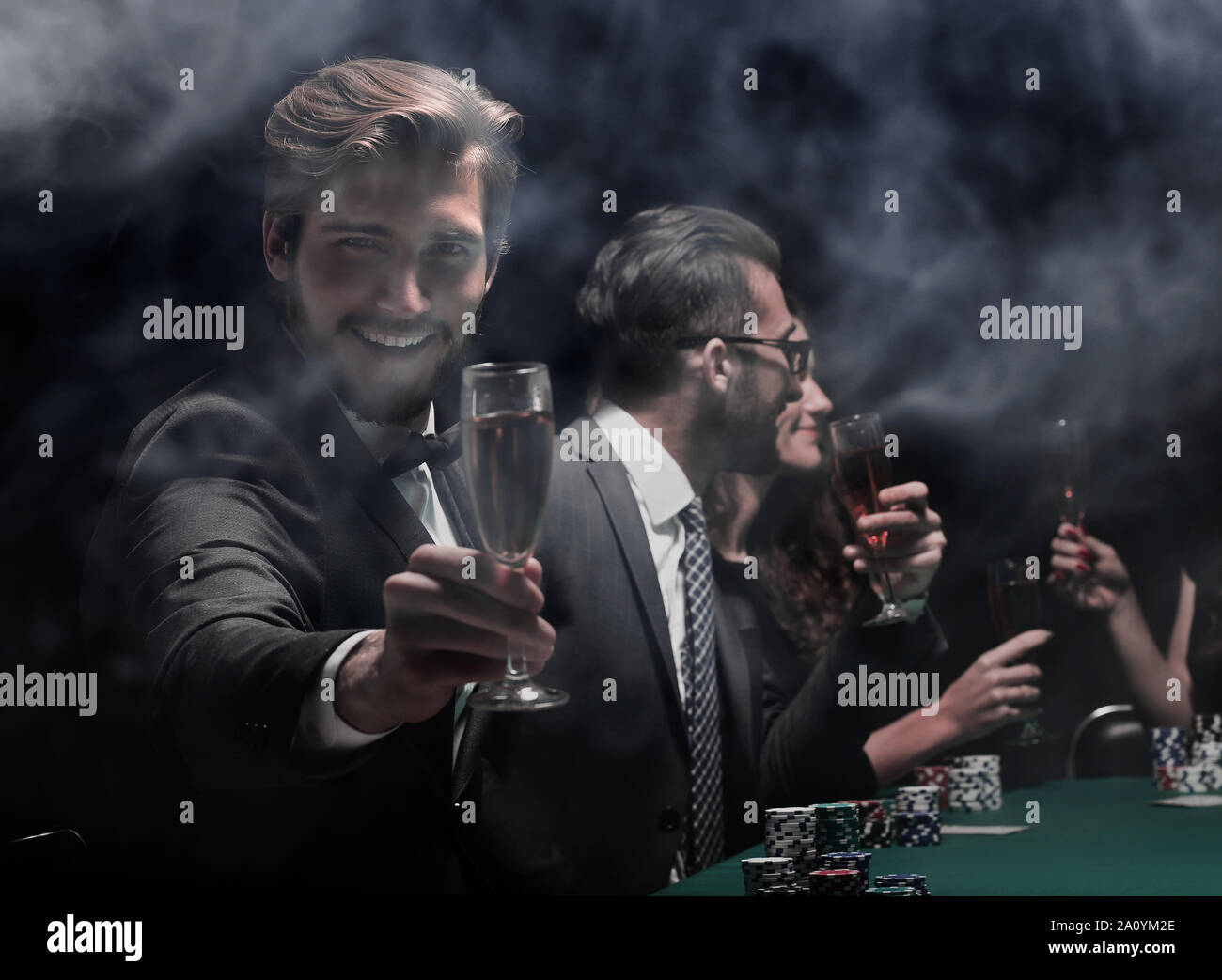 Happy and rich people celebrating their win after successful game Stock ...