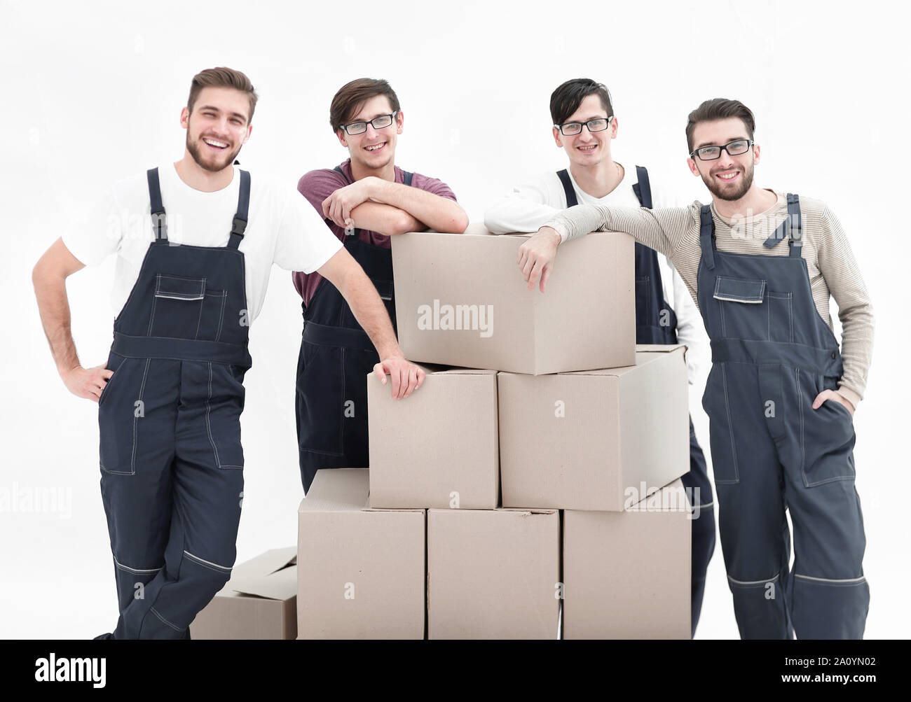 Men holding pile of carton boxes isolated on white background Stock ...