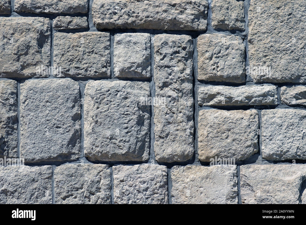 Grey stone block wall pattern and texture background Stock Photo - Alamy