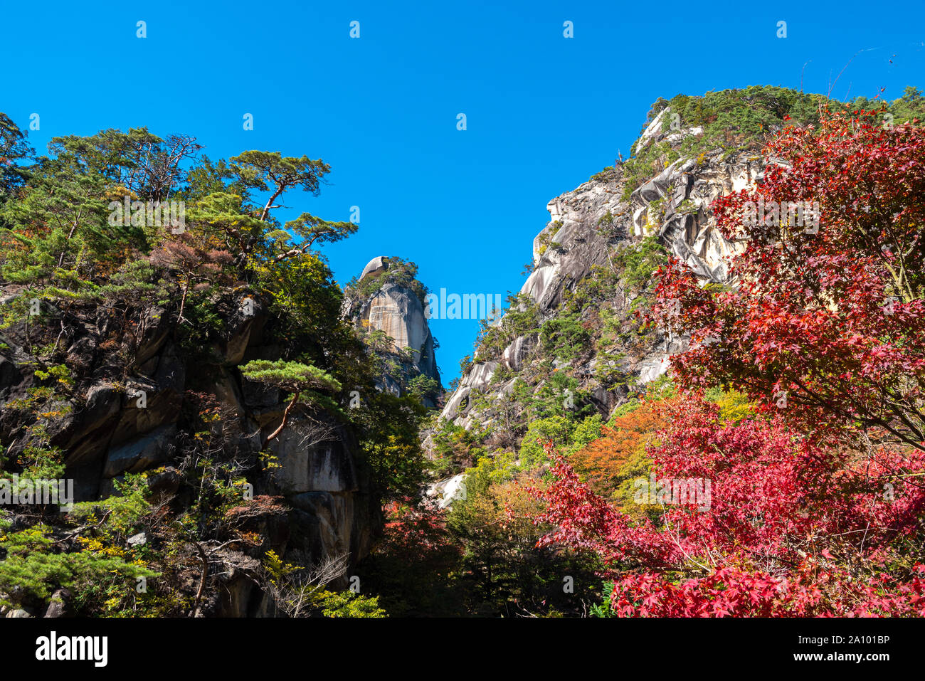 Rock Kakuenbou, a massive rocky mountain. Symbol of Mitake Shosenkyo ...