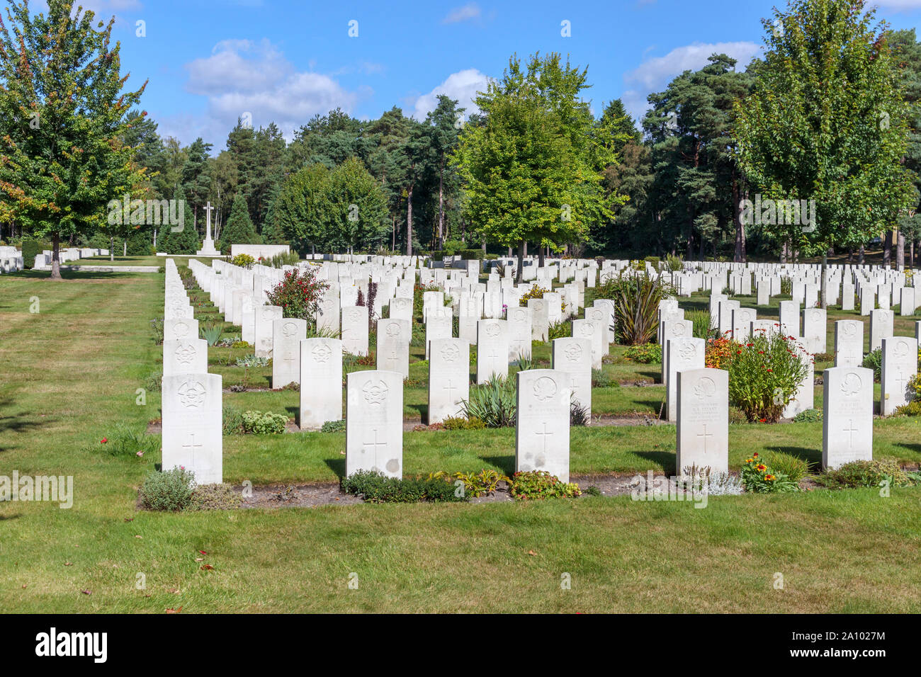 Rows of gravestones and cross in the Canadian Section of the Military ...