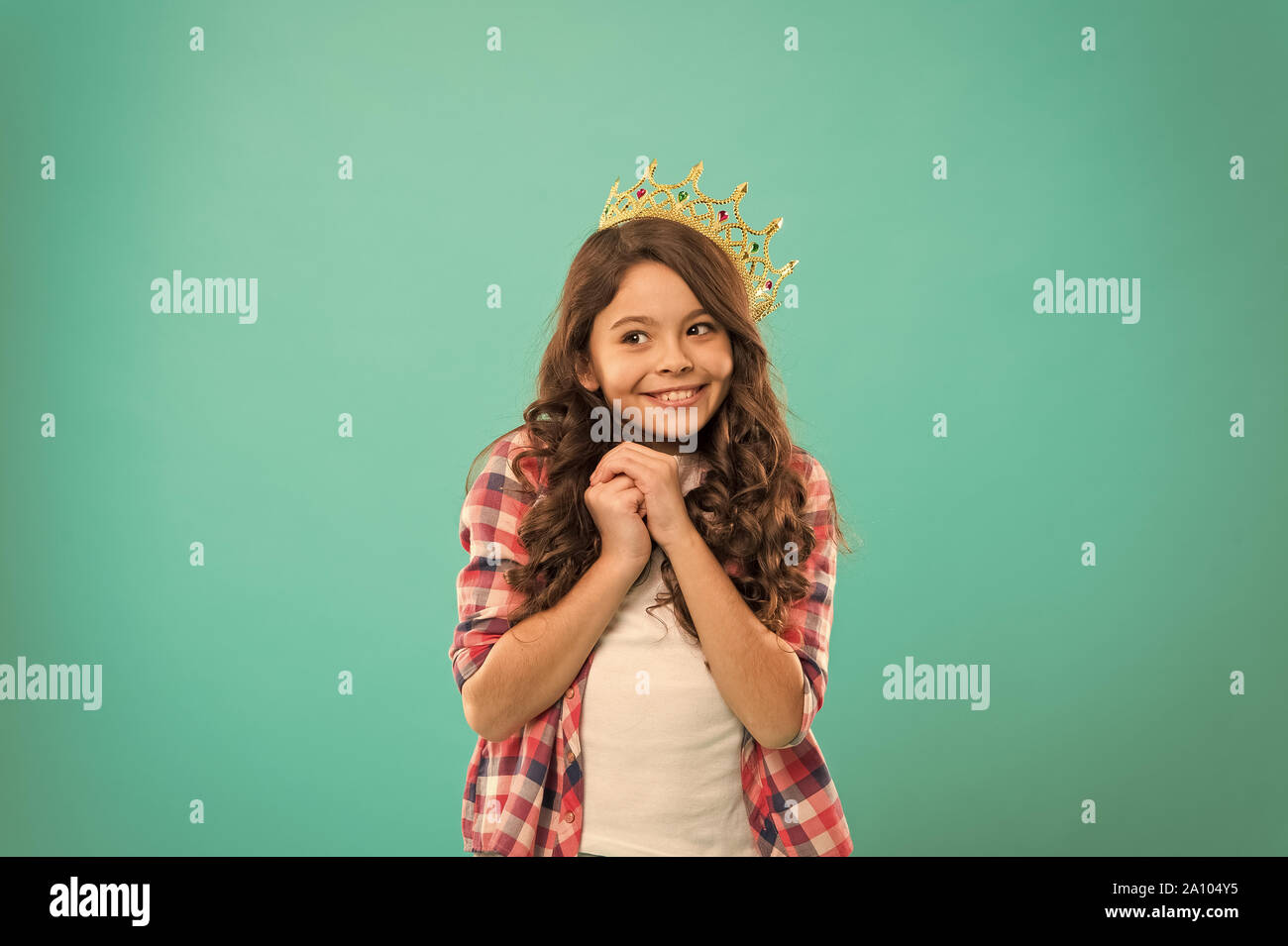 Girl cute baby wear crown while stand blue background. Become princess ...
