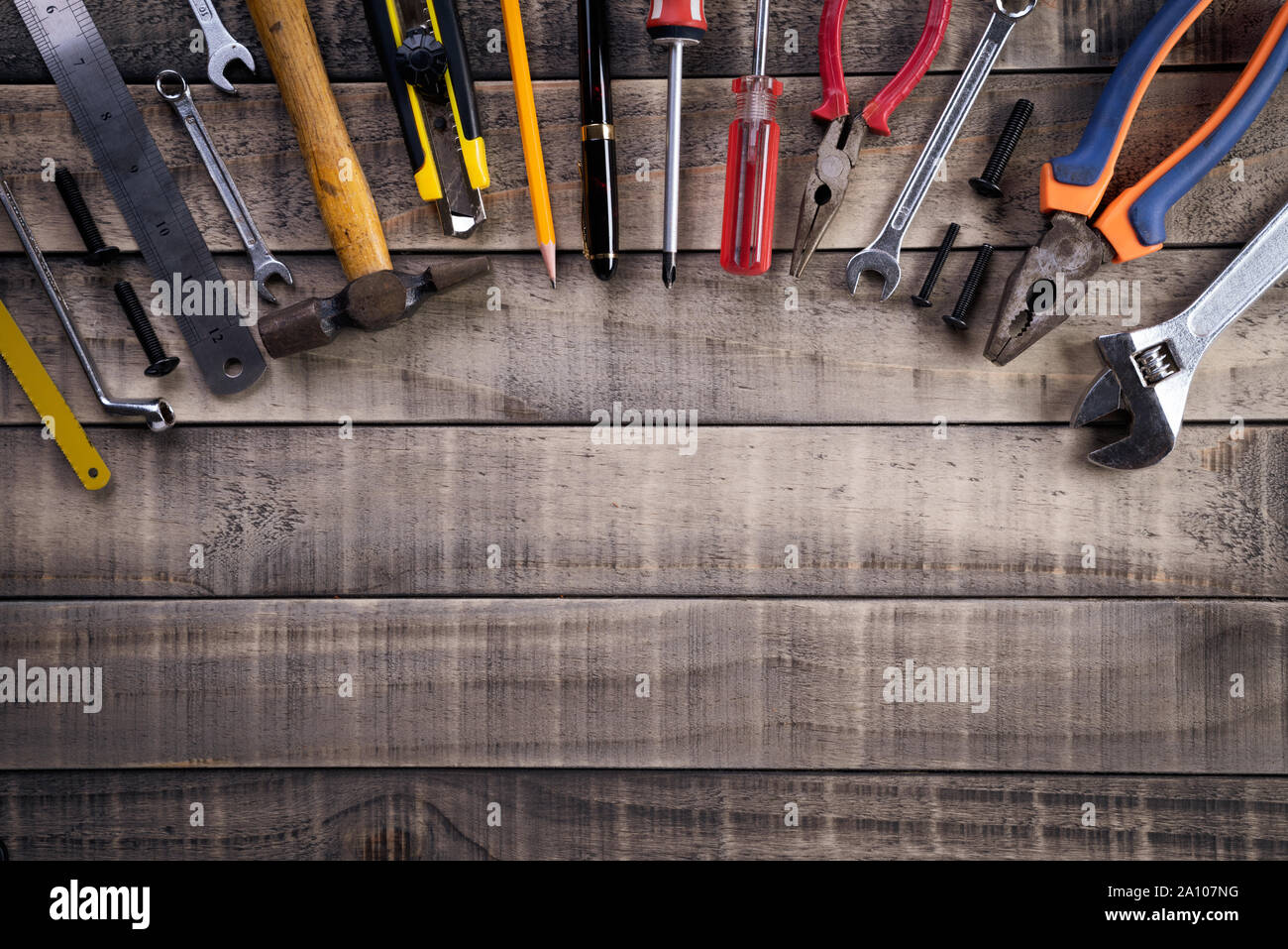 Labour Day, Many handy tools on wooden background texture Stock Photo ...